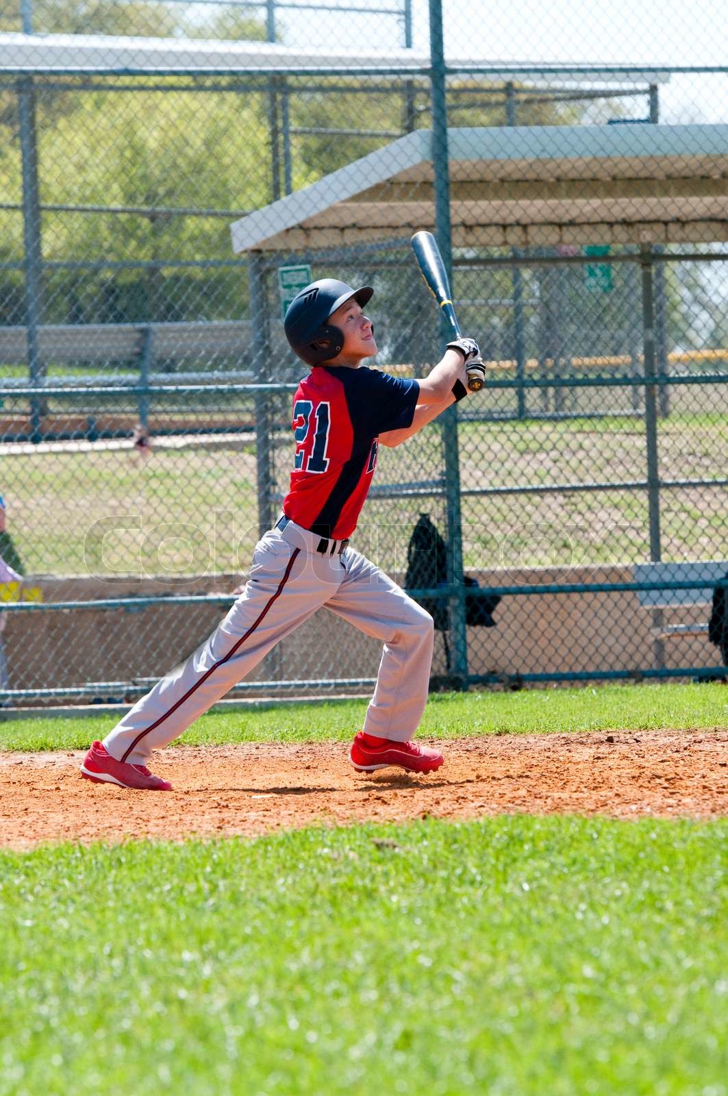 Teen baseball player at bat | Stock image | Colourbox