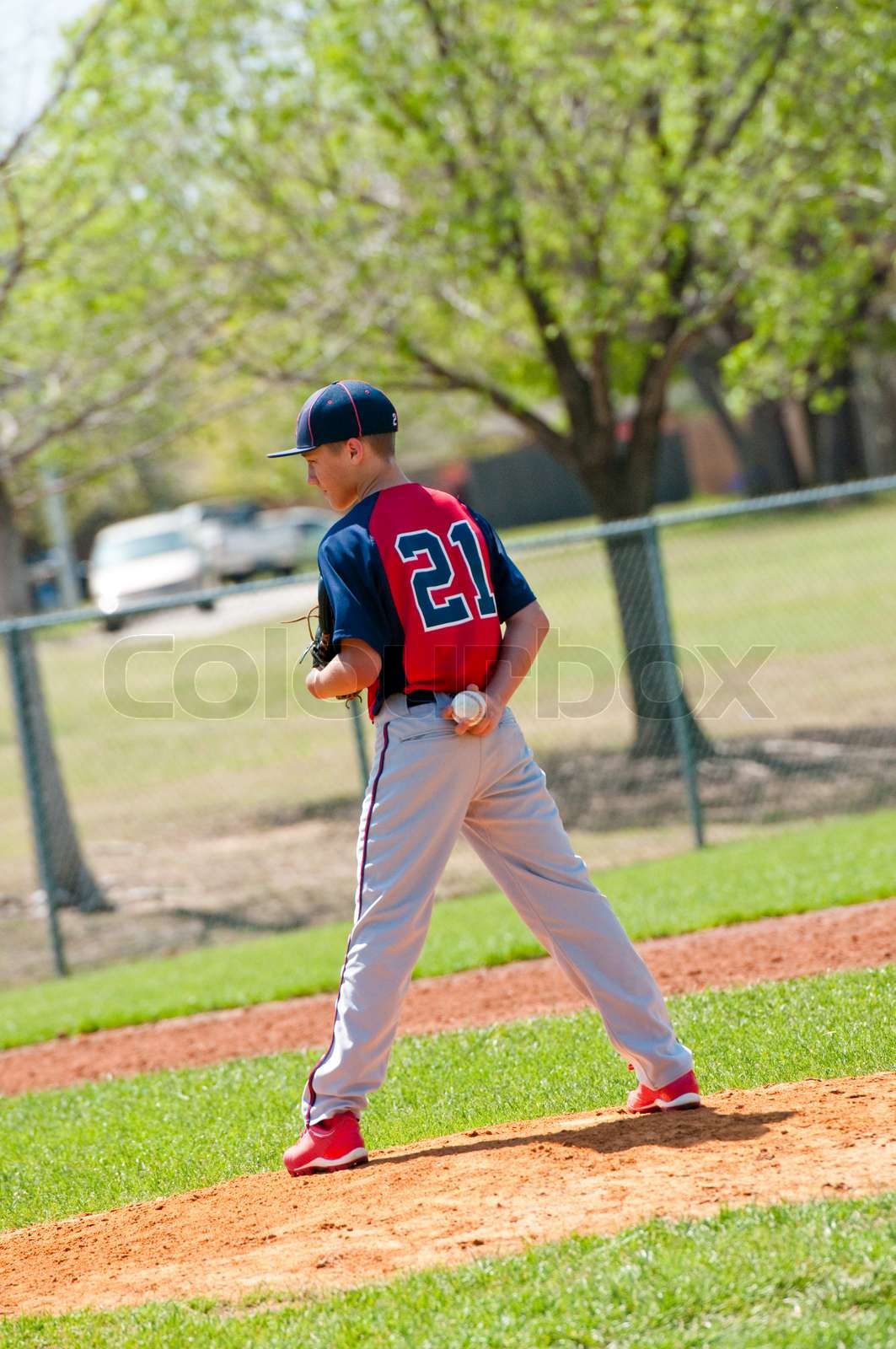 Teen baseball pitcher | Stock image | Colourbox