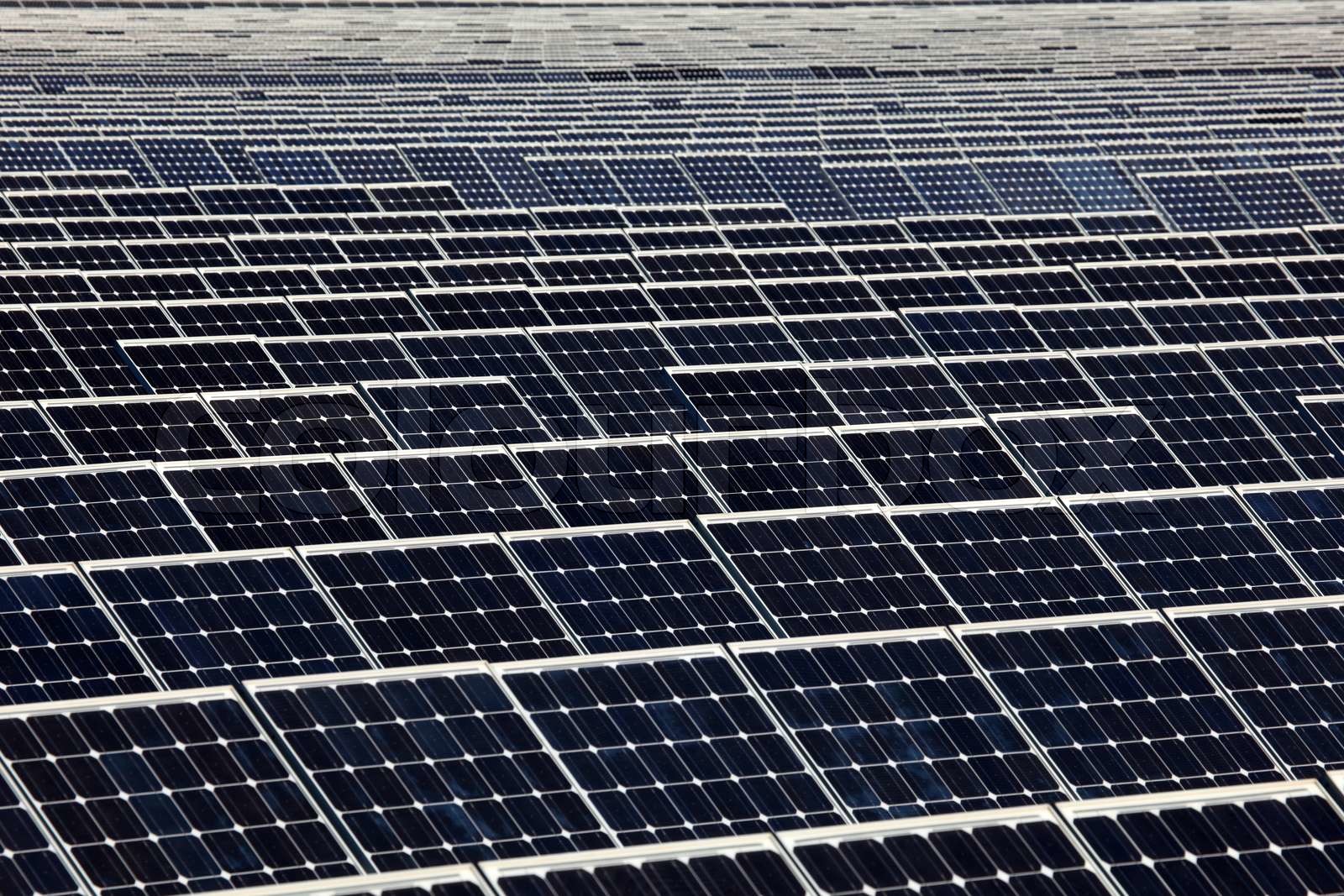 Photovoltaics panels of a solar power station | Stock image | Colourbox