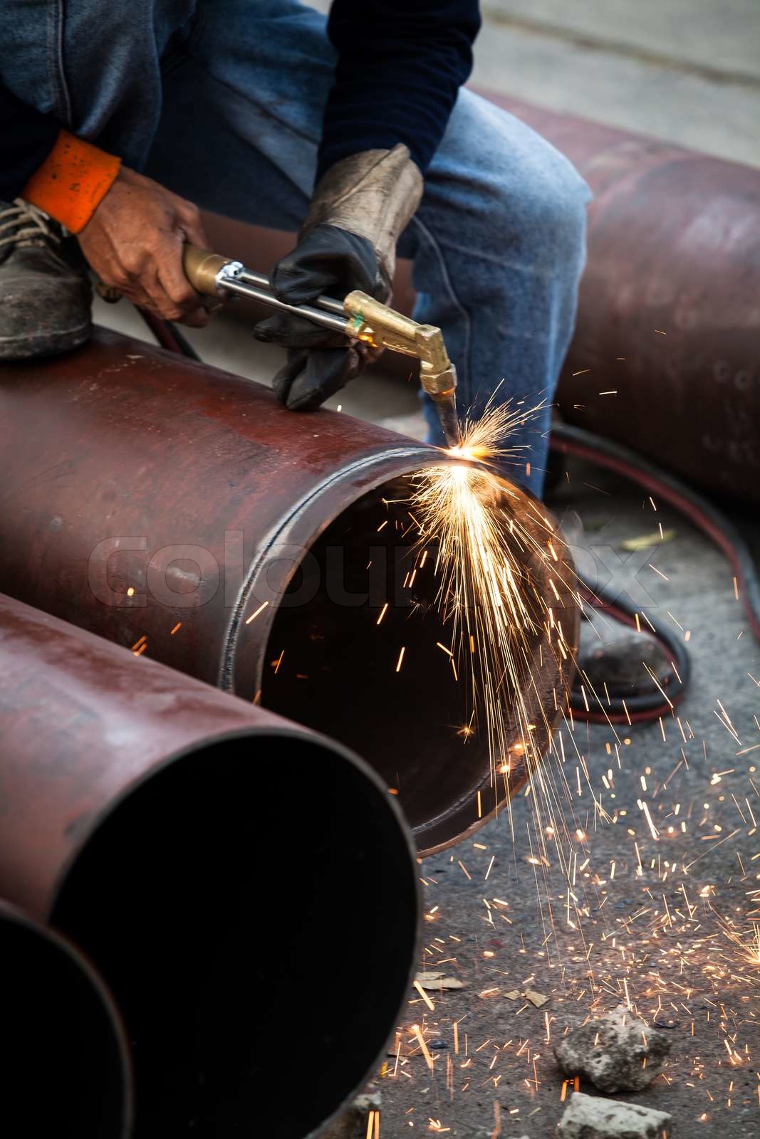 Cuting pipe | Stock image | Colourbox