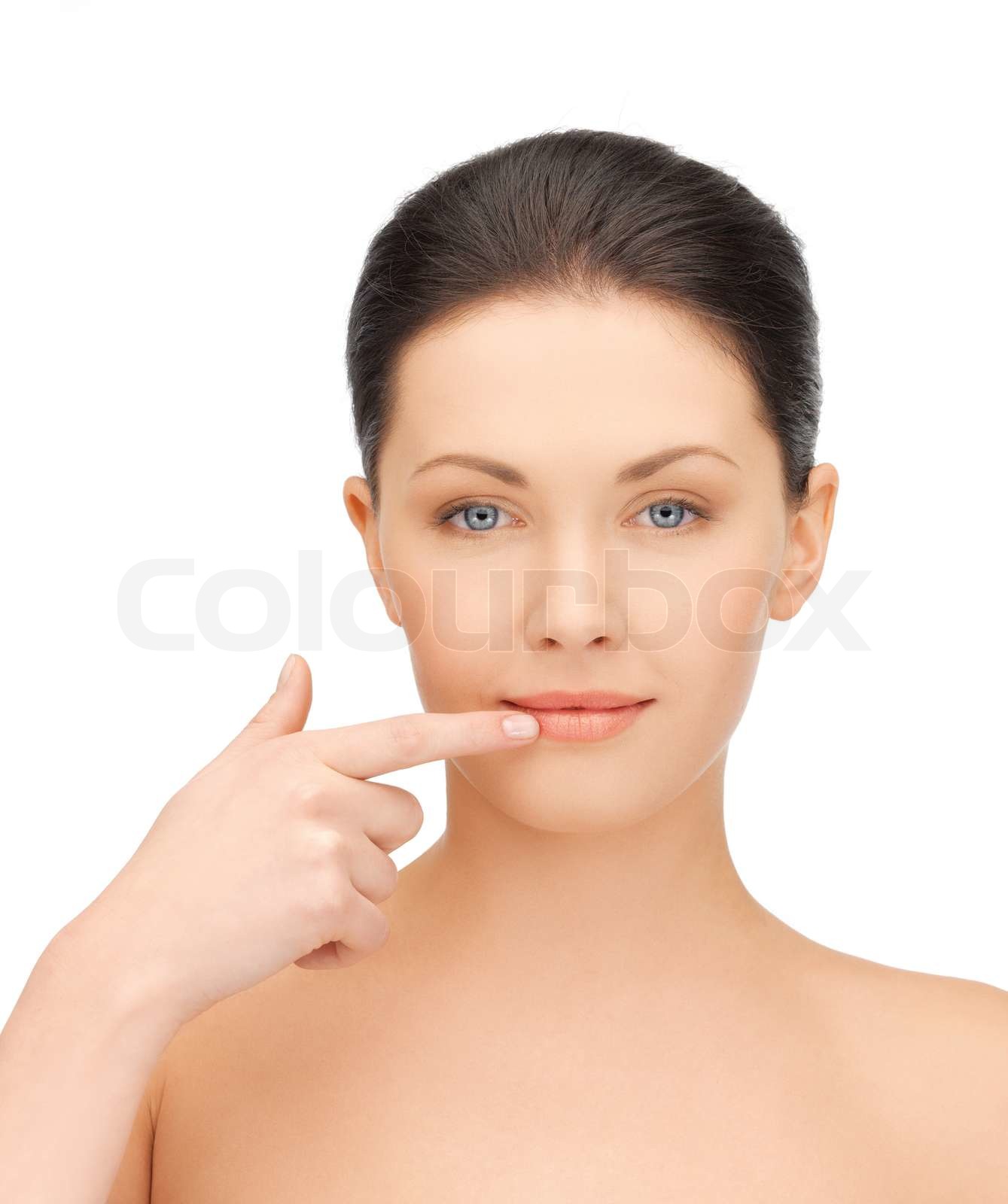 woman touching her lips | Stock image | Colourbox