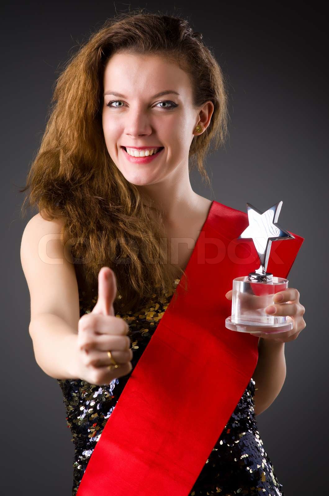 Woman winning the beauty contest | Stock image | Colourbox