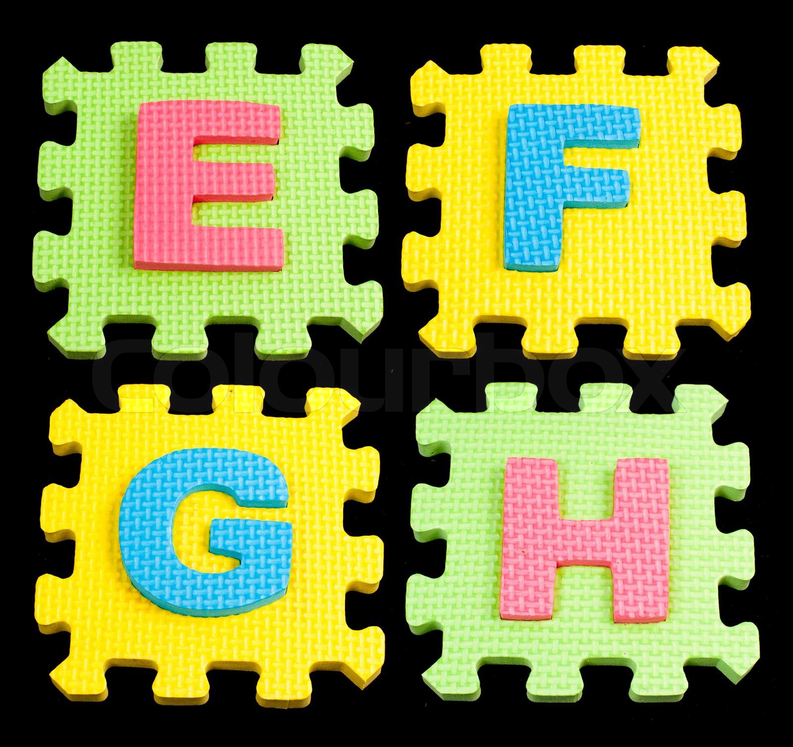 EFGH Alphabet learning blocks isolated Black | Stock image | Colourbox
