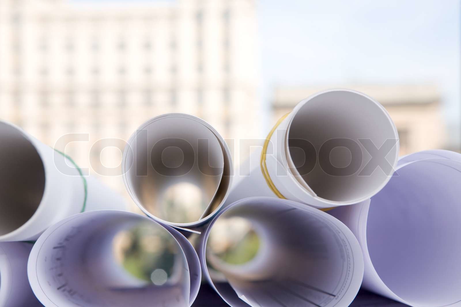 Rolled blueprints | Stock image | Colourbox