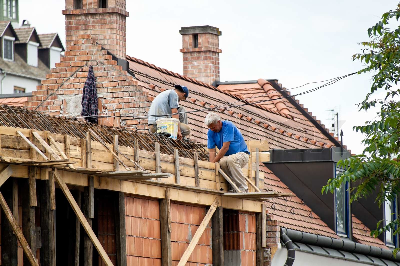 construction worker at roofing | Stock image | Colourbox