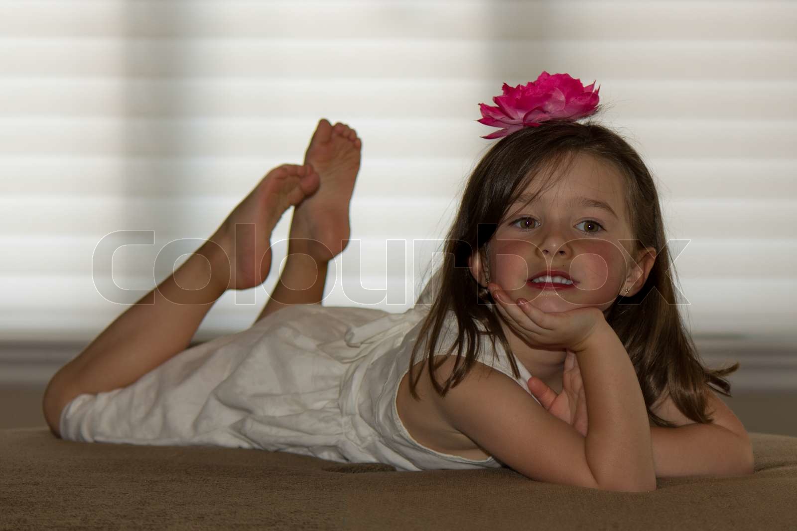 Beautiful, happy child posing | Stock image | Colourbox