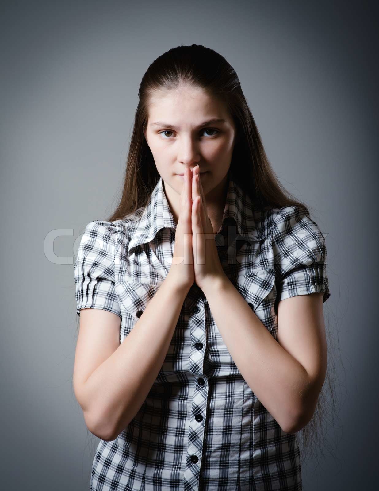 girl praying | Stock image | Colourbox