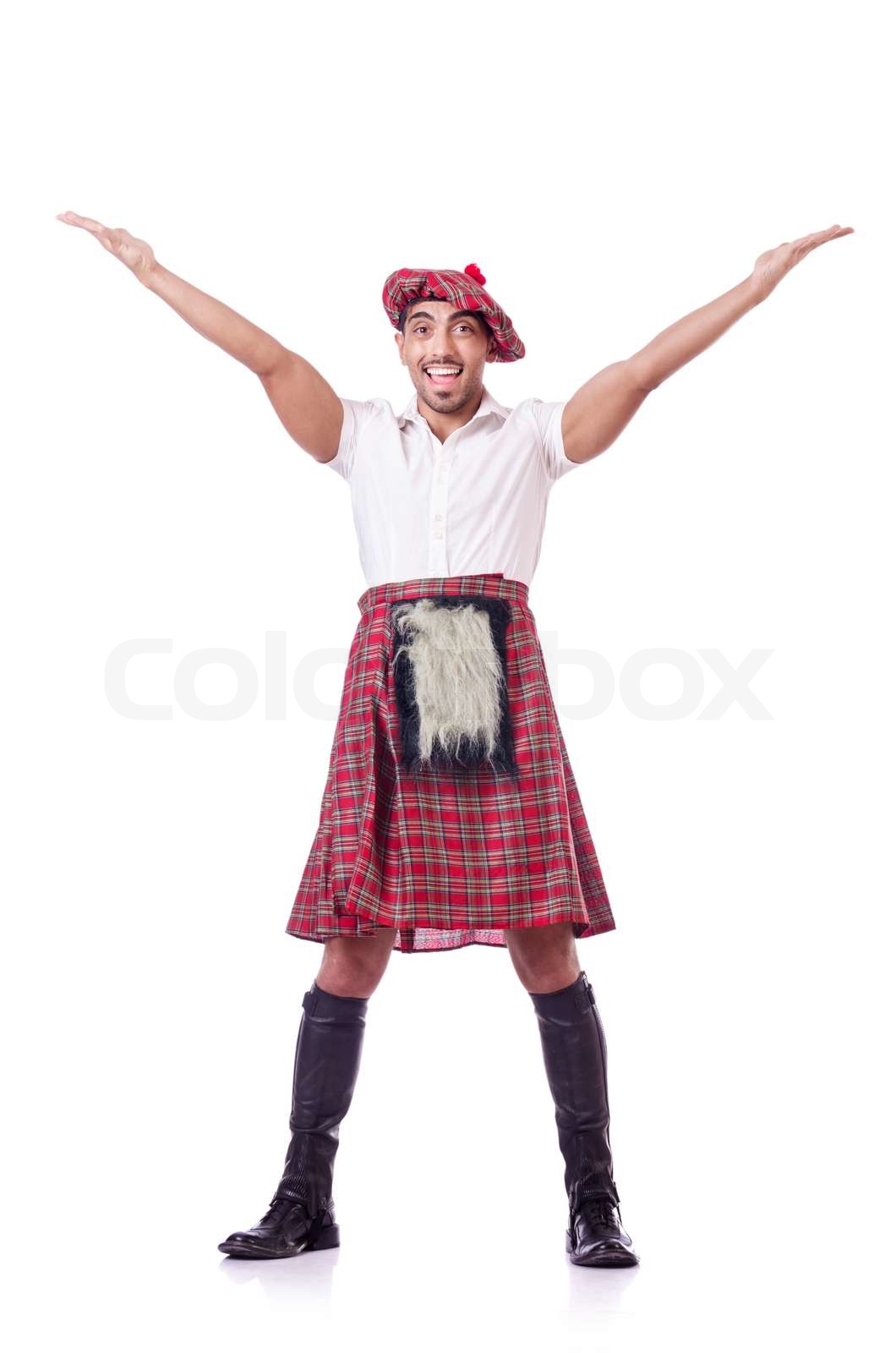 Scottish man dancing on white | Stock image | Colourbox