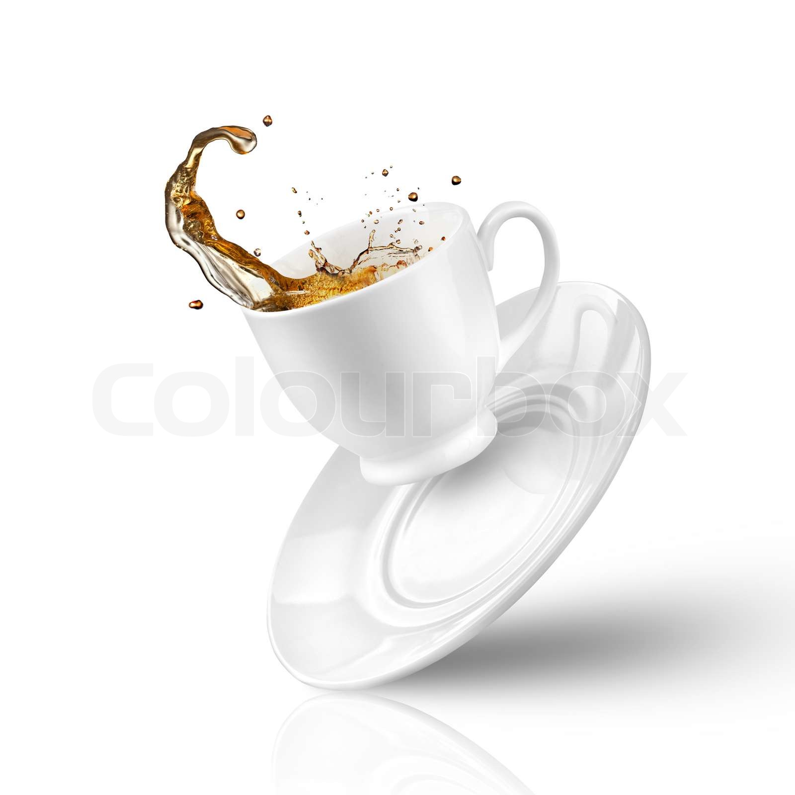 Splash of tea in the falling cup isolated on white | Stock image ...