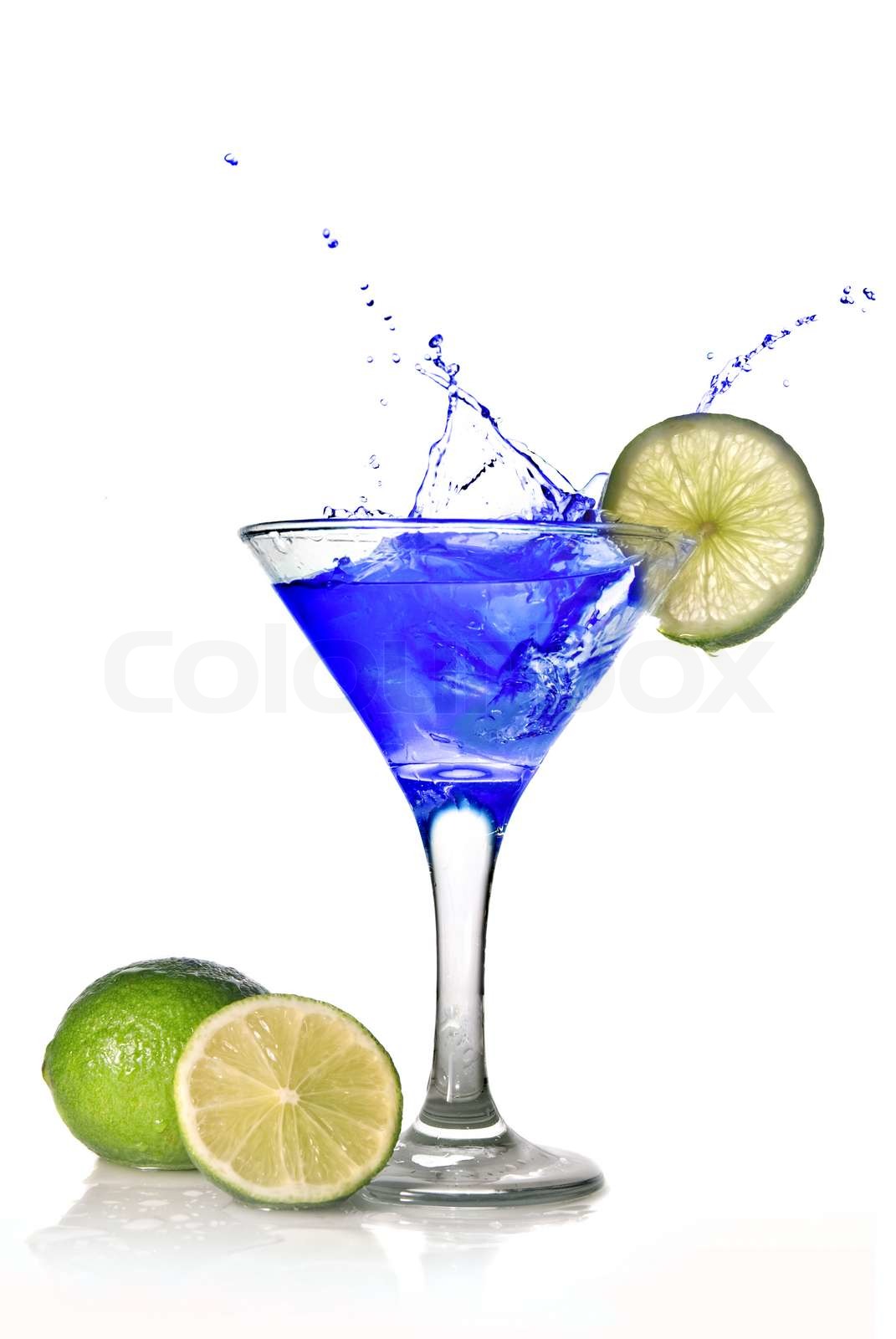 Blue cocktail with splash isolated on white | Stock image | Colourbox