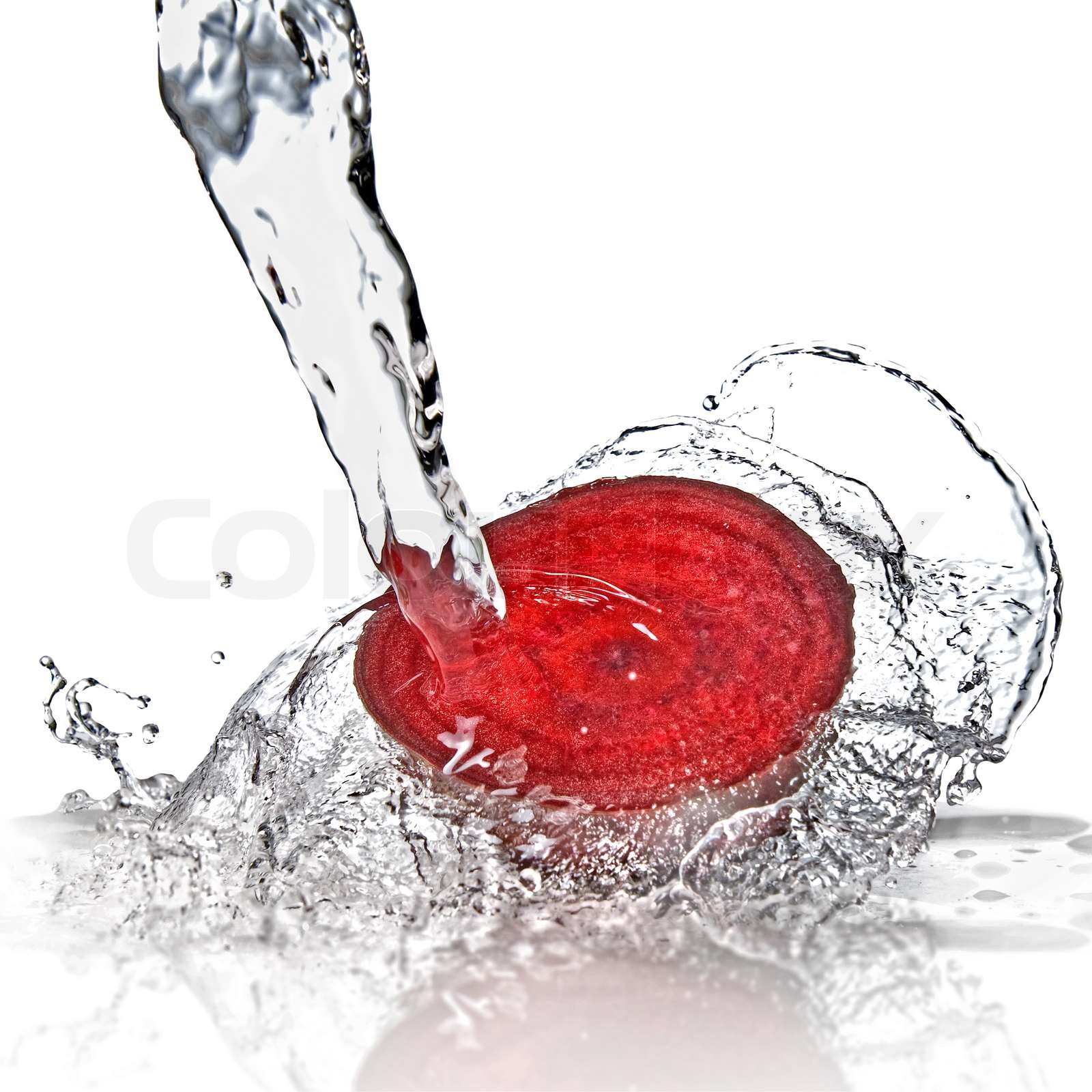 red beet with water splash isolated on white | Stock image | Colourbox