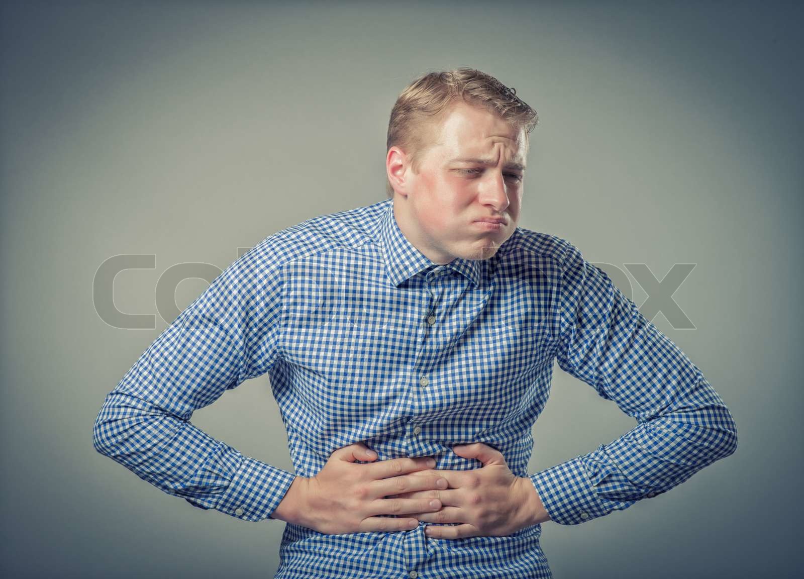 Young man with strong stomach | Stock image | Colourbox
