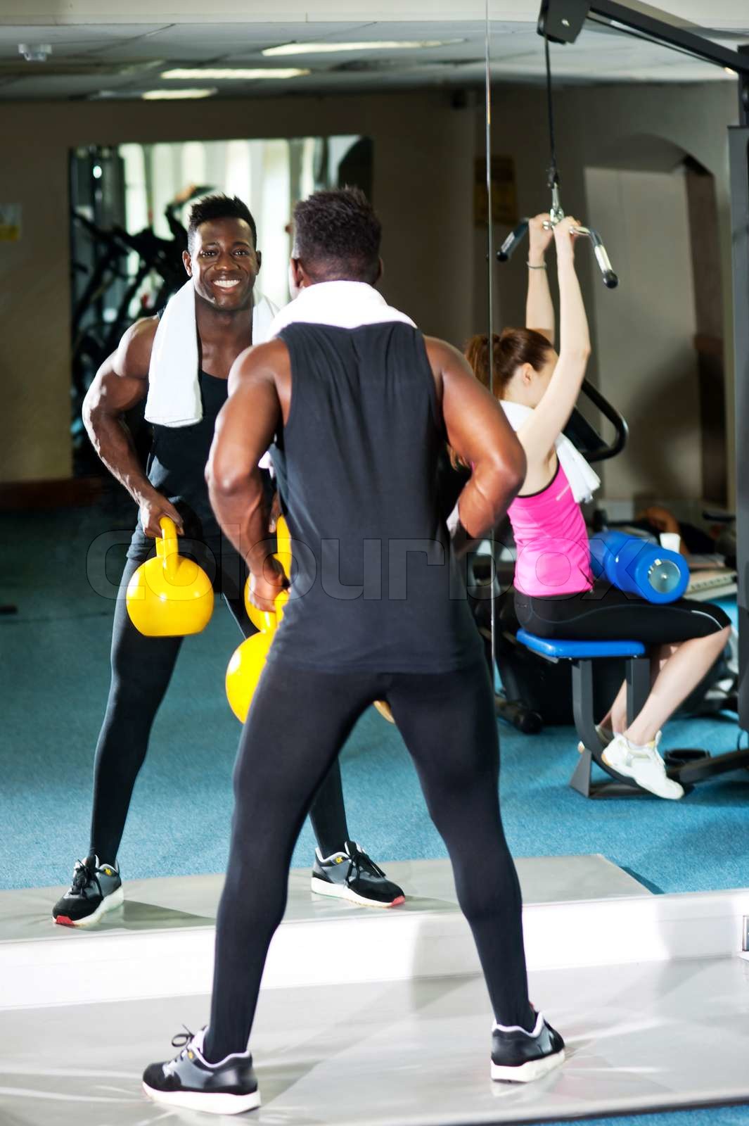 Fitness people working out with equipments | Stock image | Colourbox