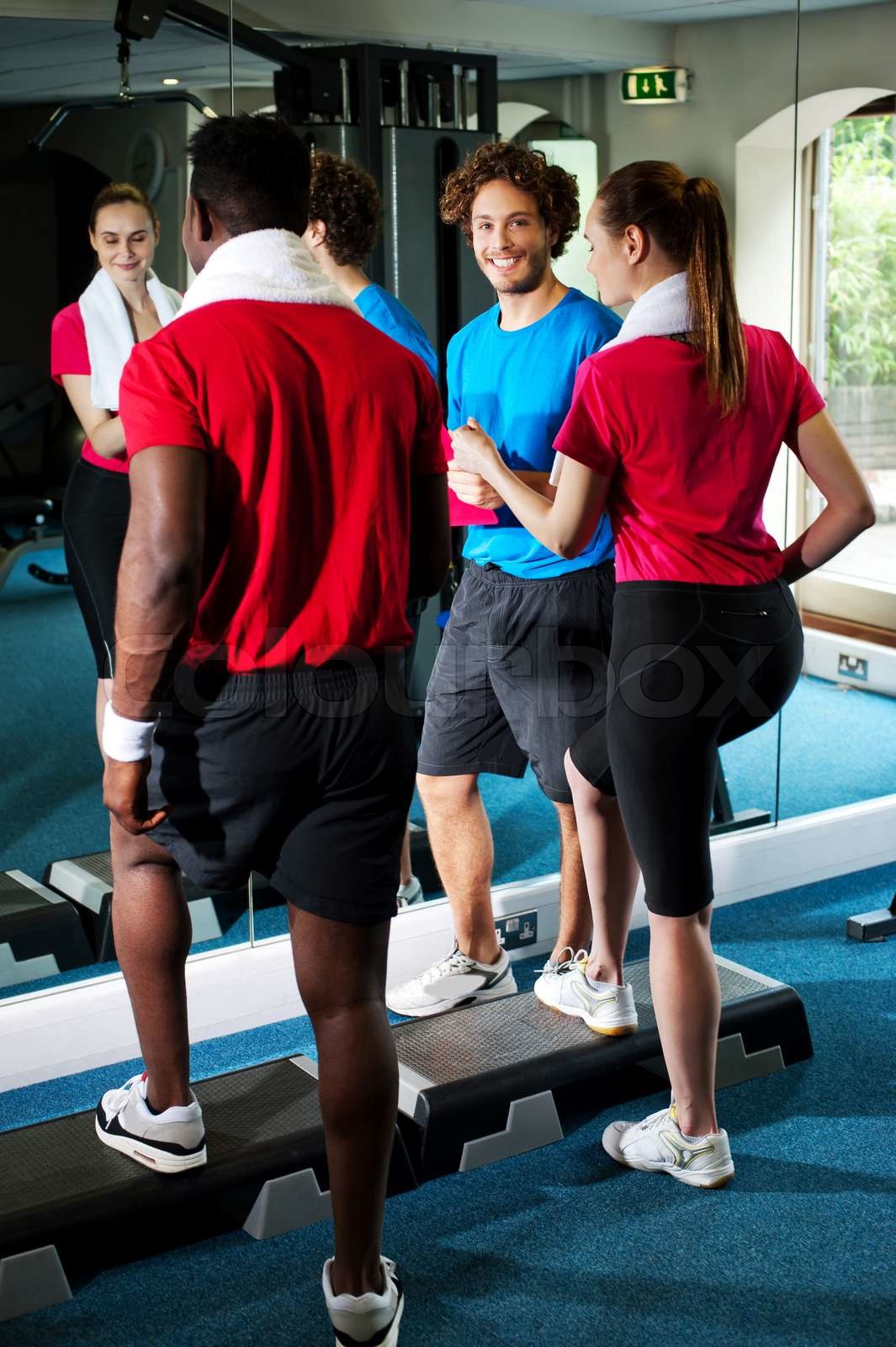 Fit people working out in fitness centre | Stock image | Colourbox