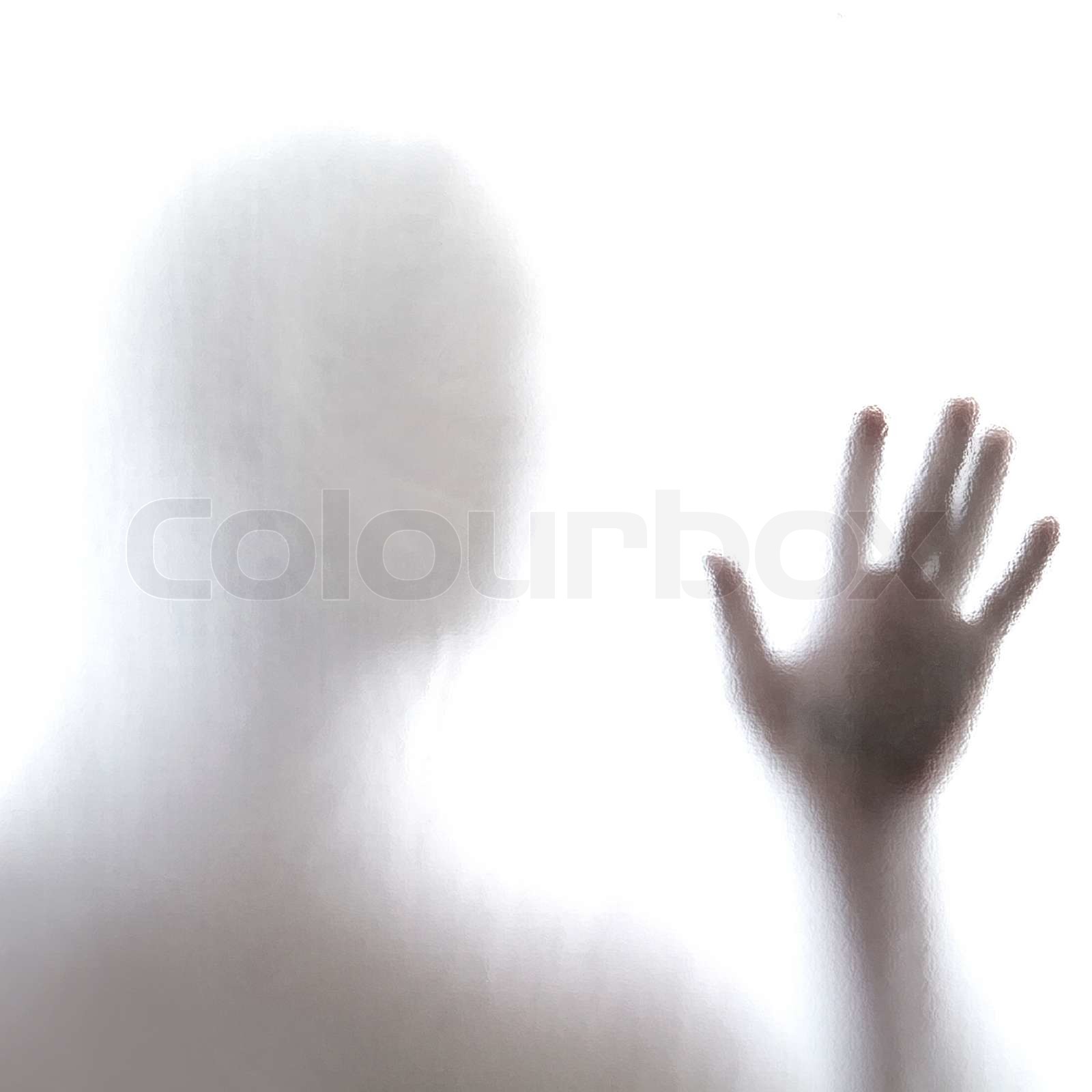 Man Standing Behind Frosted Glass Stock Image Colourbox