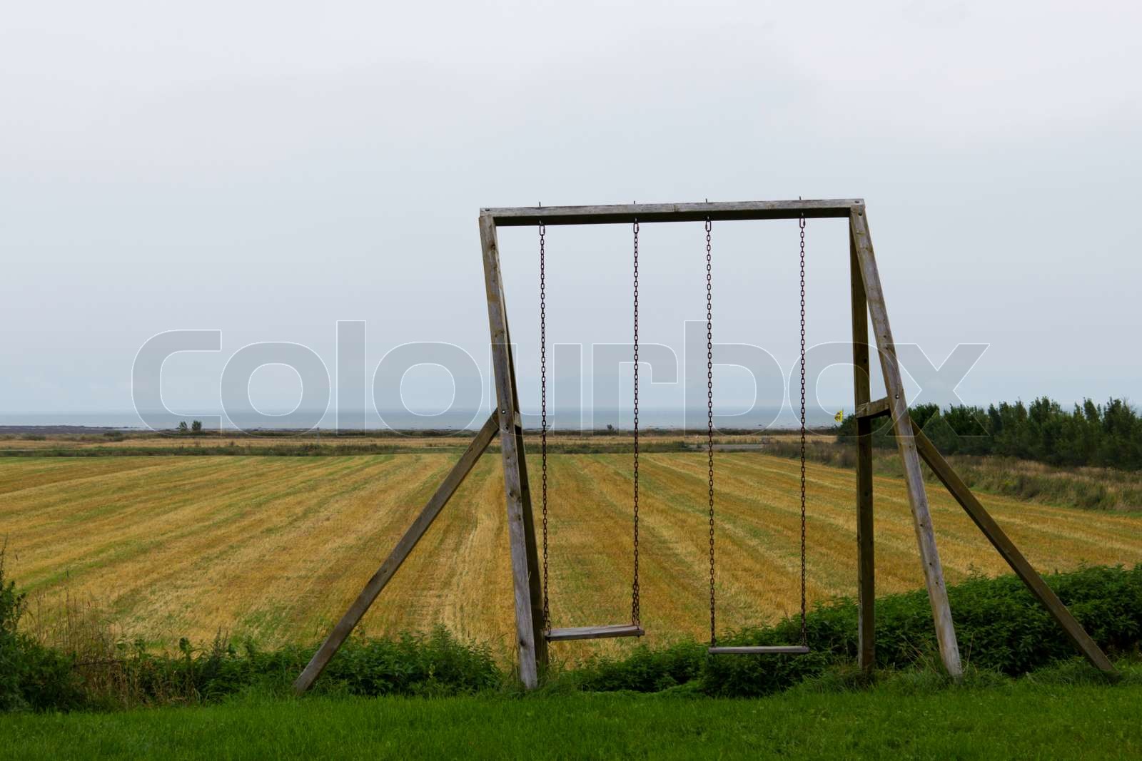 Swing set on the farm | Stock image | Colourbox