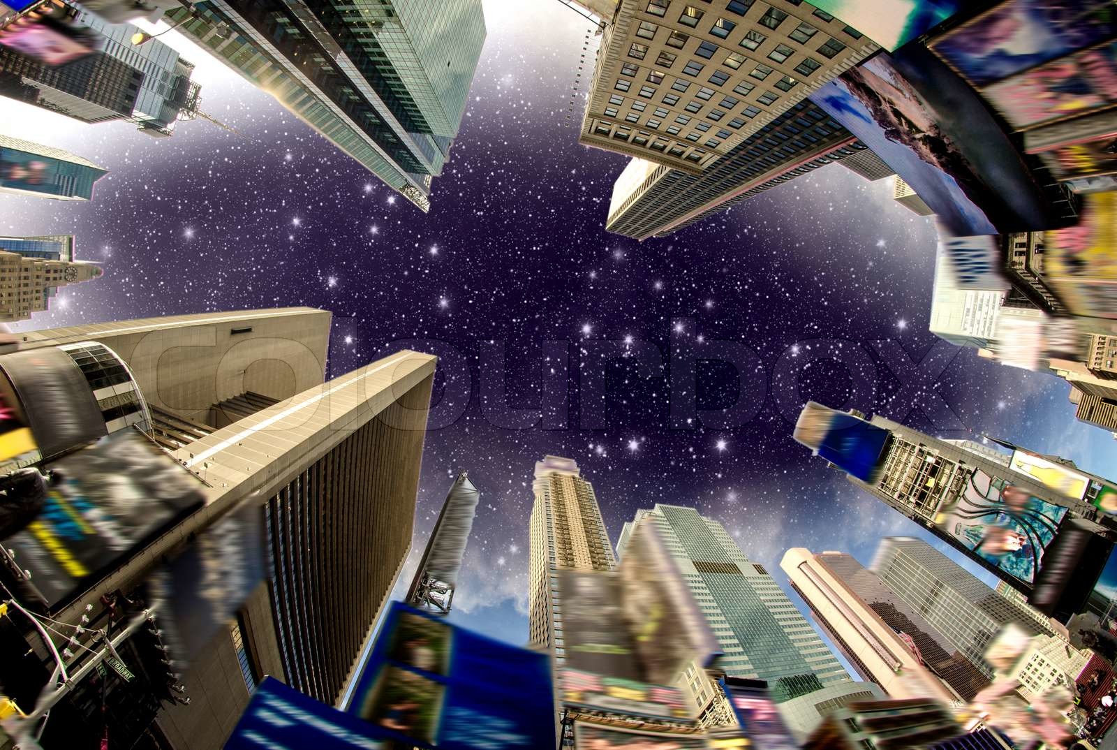 Times Square Building viewed from the street with dramatic sky and ads ...