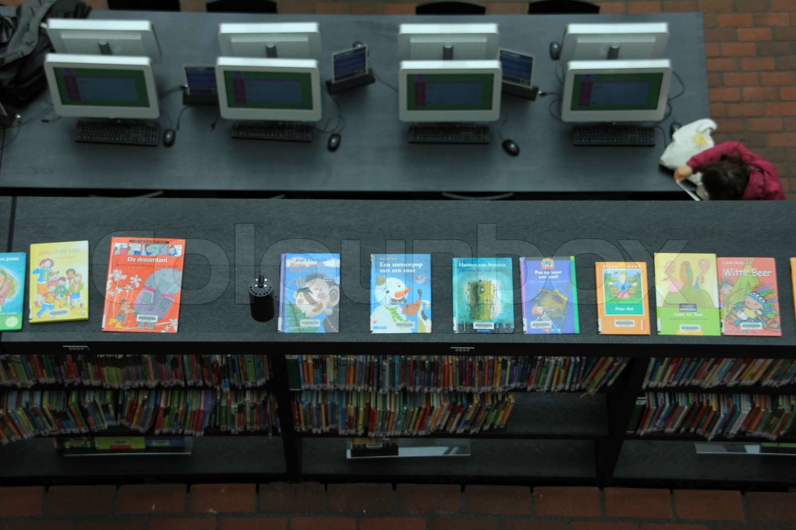 Screens and books. | Stock image | Colourbox