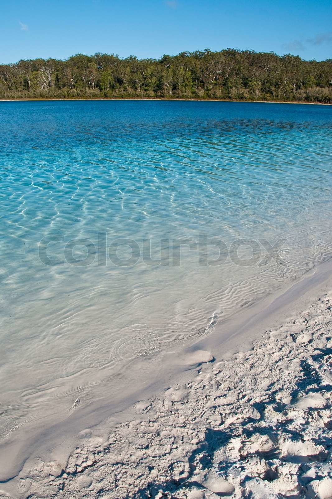 The clear water of this amazing lake viewed from the beach | Stock ...