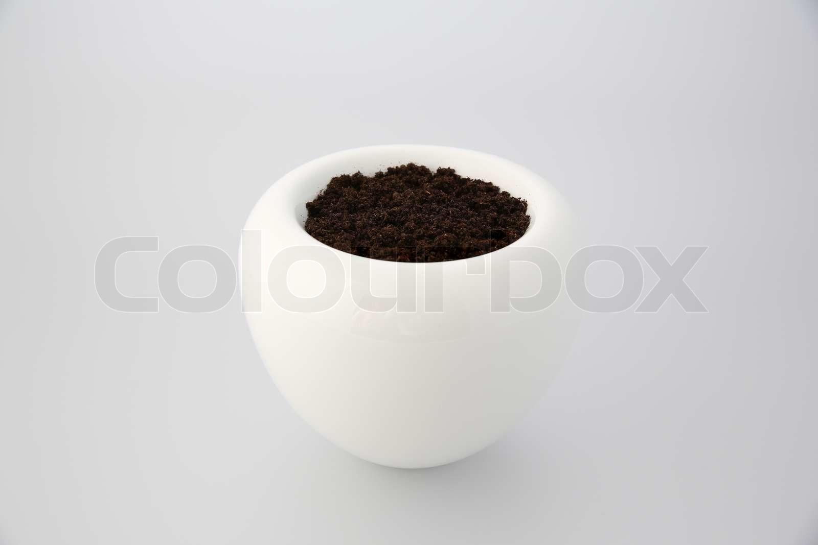 White Flower Pot with Soil | Stock image | Colourbox