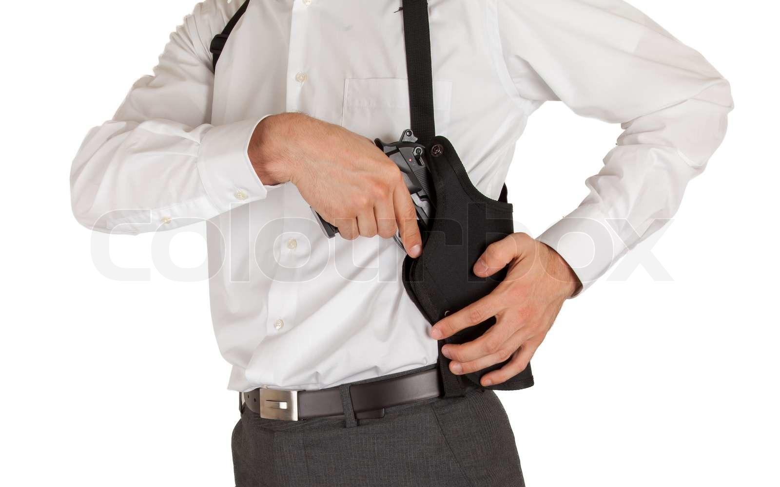 Secret service agent with a gun | Stock image | Colourbox