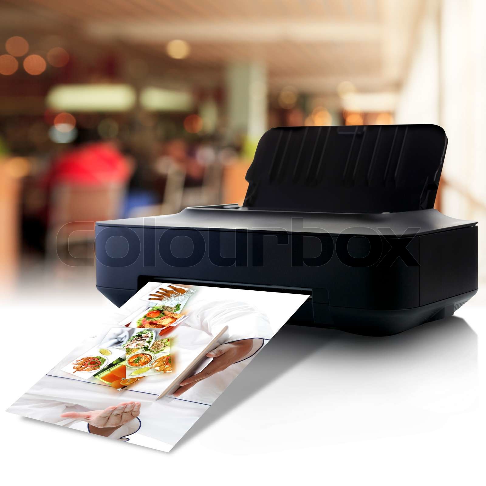Printer and picture with menu in a restaurant | Stock image | Colourbox