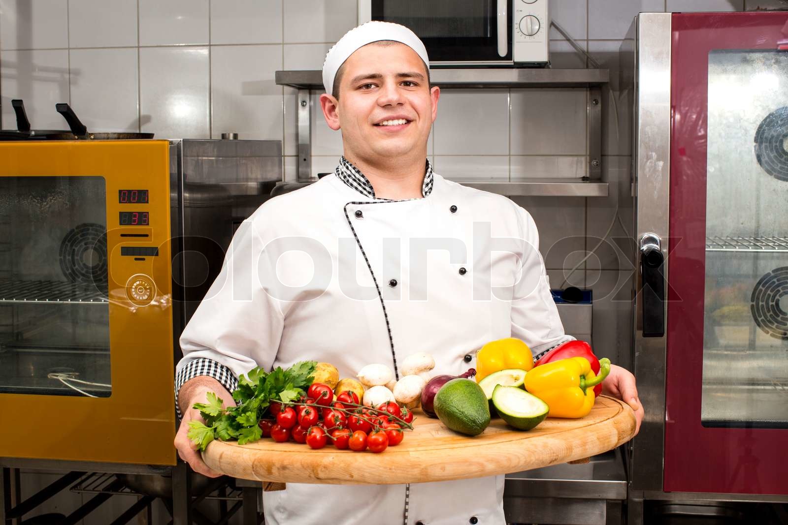 chef preparing food in the kitchen at the restaurant | Stock image ...
