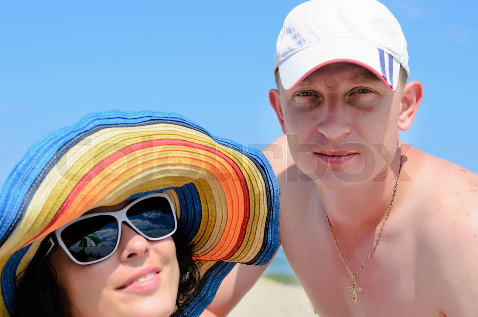 Couple sunbathing | Stock image | Colourbox