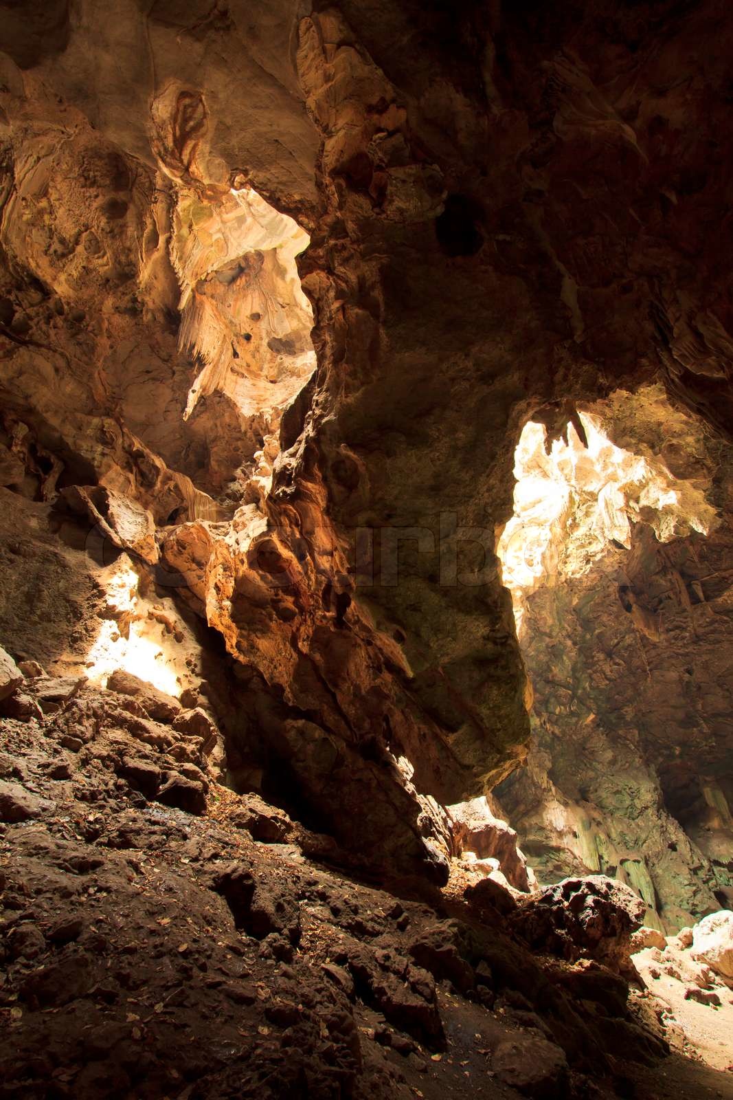 Sun rays in cave in thailand | Stock image | Colourbox