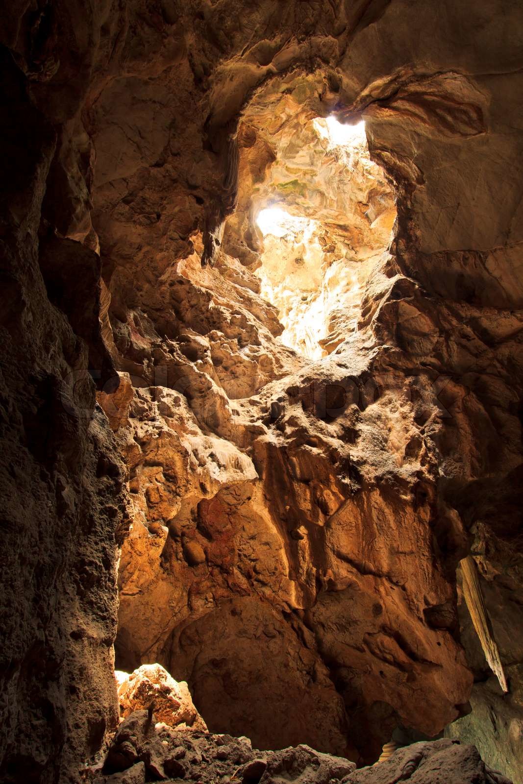 Sun rays in cave in thailand | Stock image | Colourbox