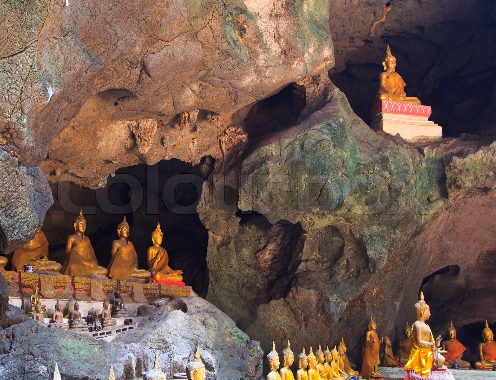 Old Buddha in a cave thailand | Stock image | Colourbox