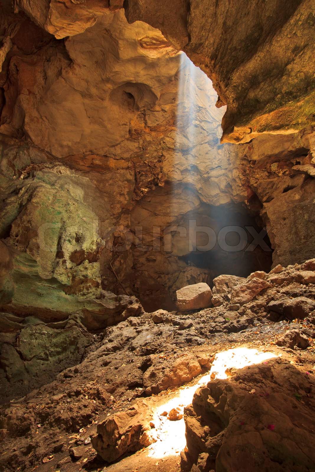 Sun rays in cave in thailand | Stock image | Colourbox