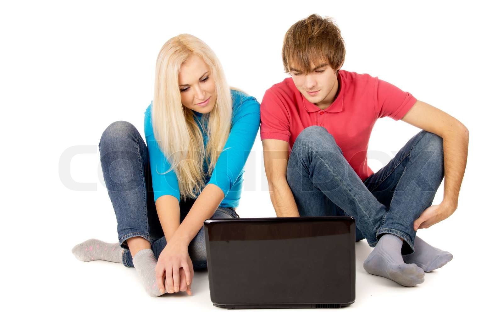 the happy family is looking into the notebook computer | Stock image ...