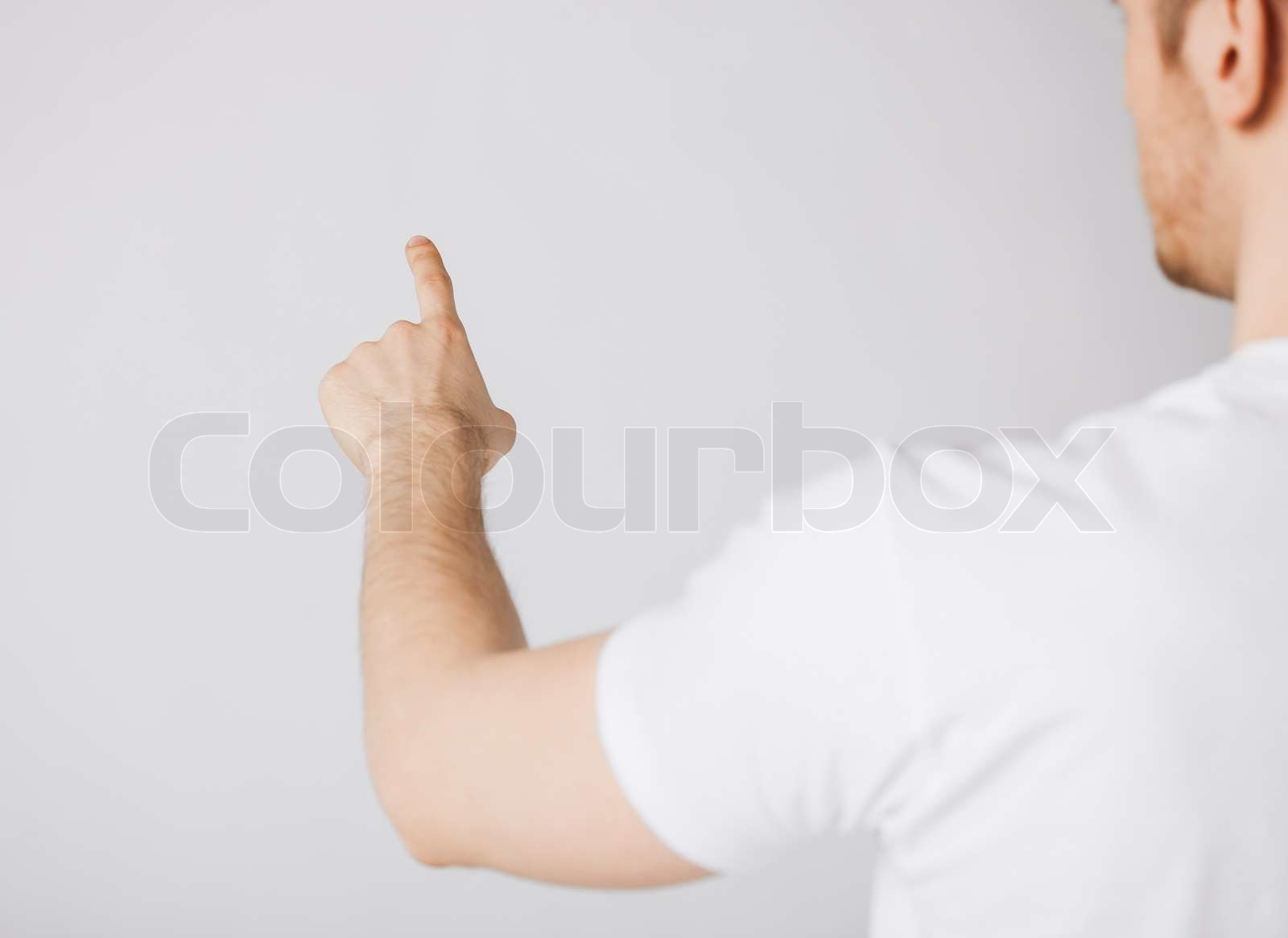man hand pointing at something | Stock image | Colourbox