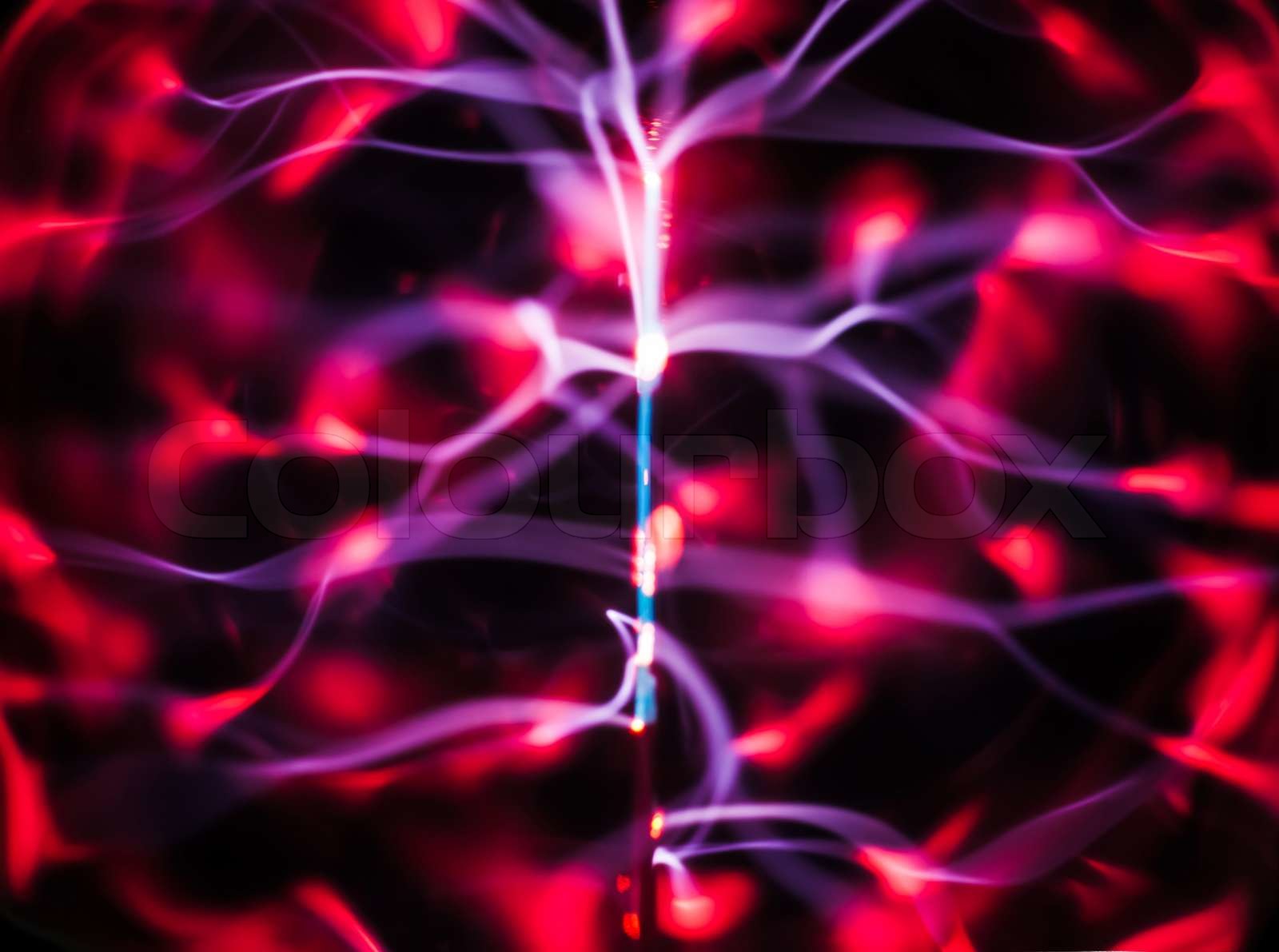 Plasma and energy: light beams in the darkness | Stock image | Colourbox