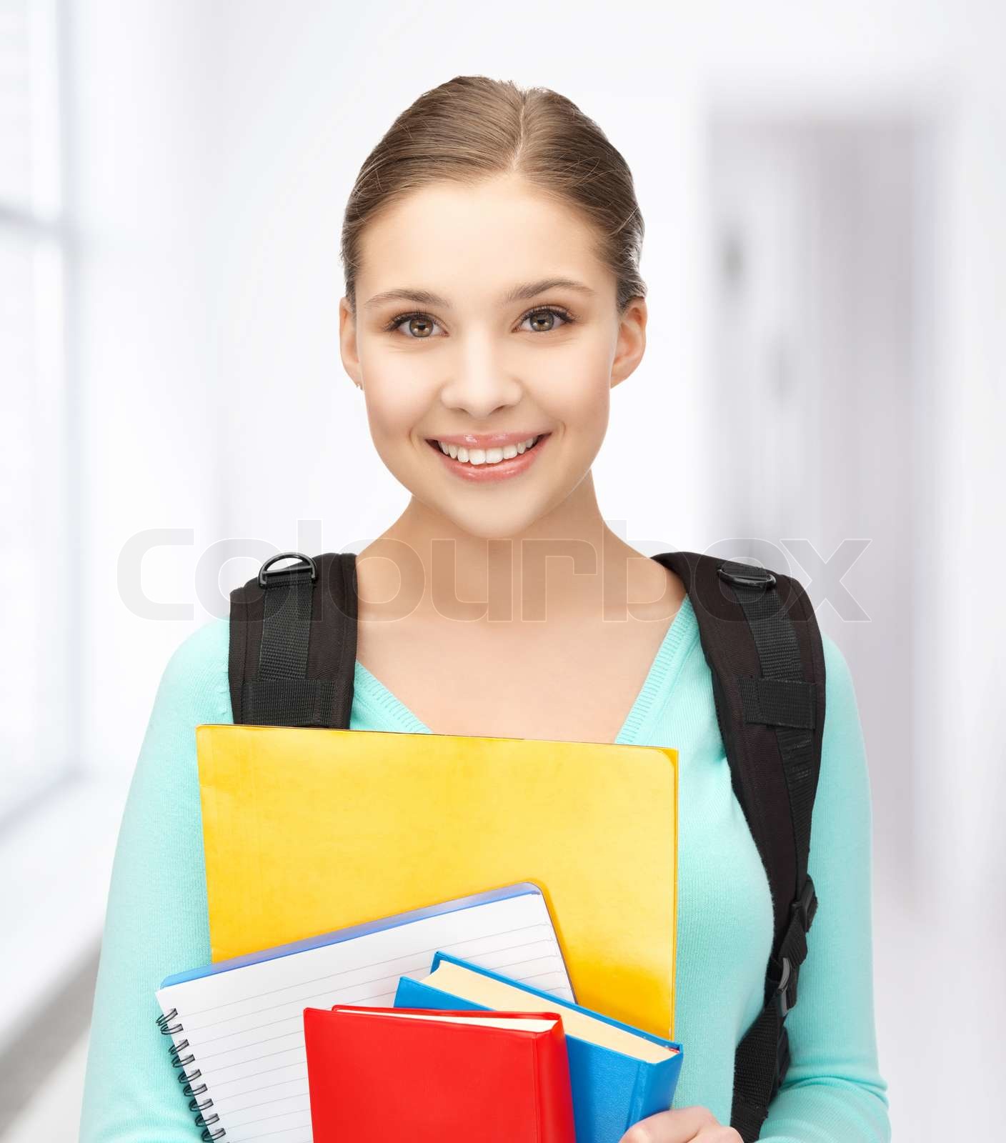 Studentin mit Bücher und Schultasche | Stock Bild | Colourbox