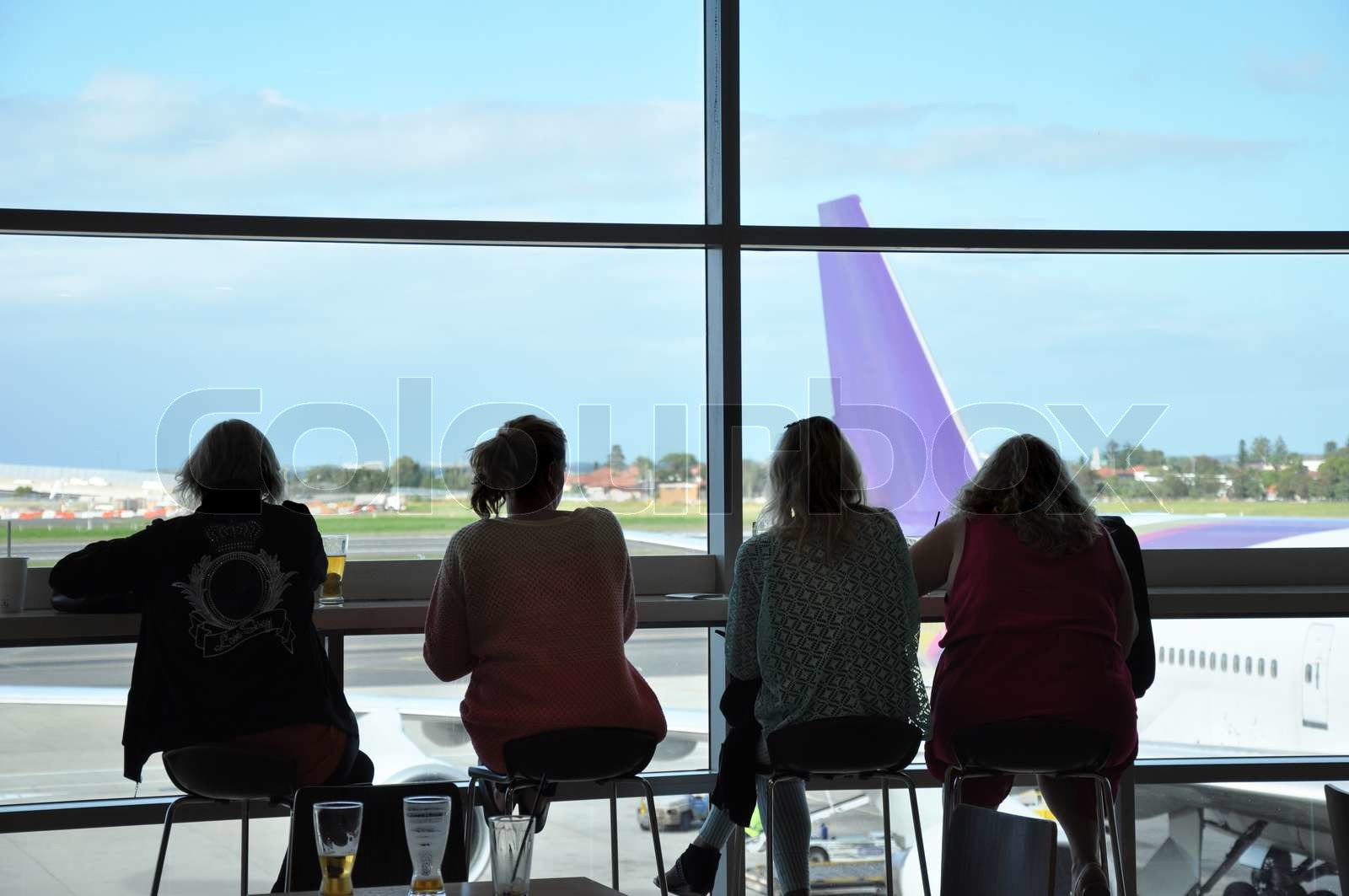 Passengers waiting for the flight at the airport | Stock image | Colourbox