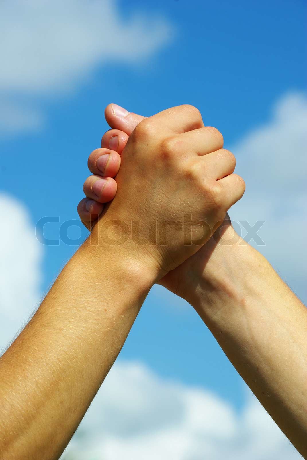 Hand in a hand | Stock image | Colourbox