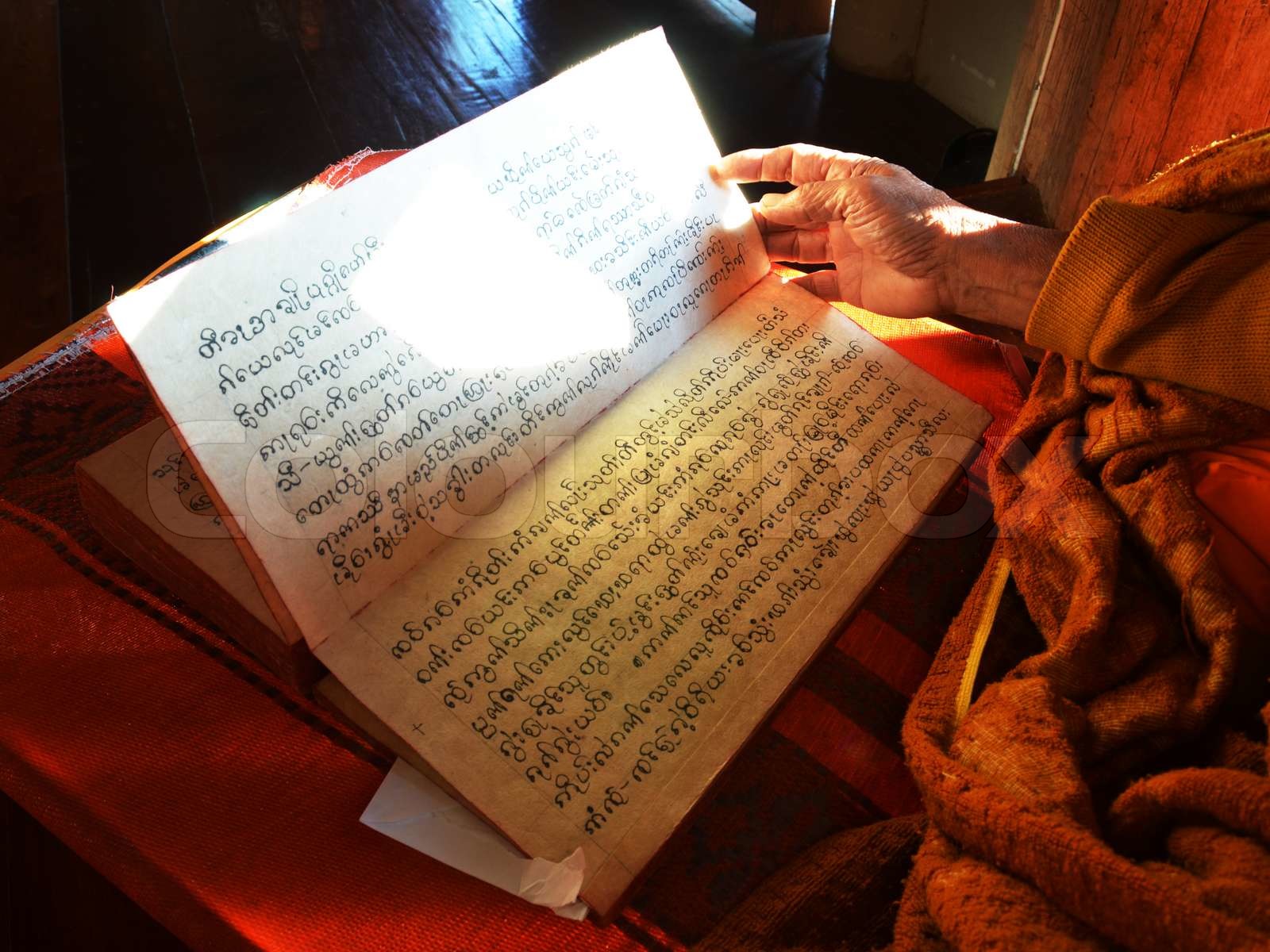 Monk reading Scripture of Tales of the Lord Buddha's Former Births ...