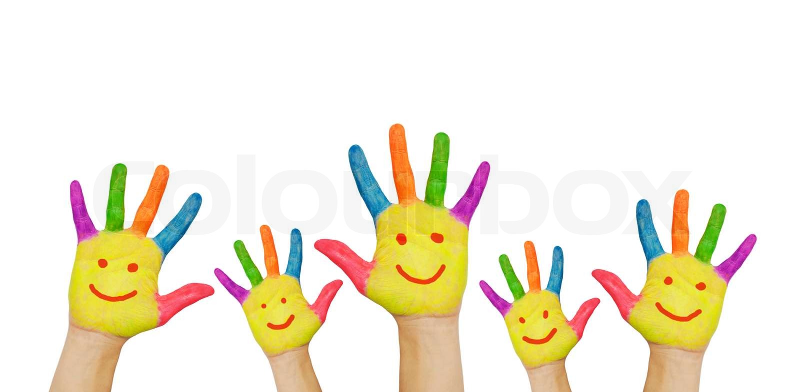 Kinder lächelnd bunte Hände auferweckt | Stock Bild | Colourbox