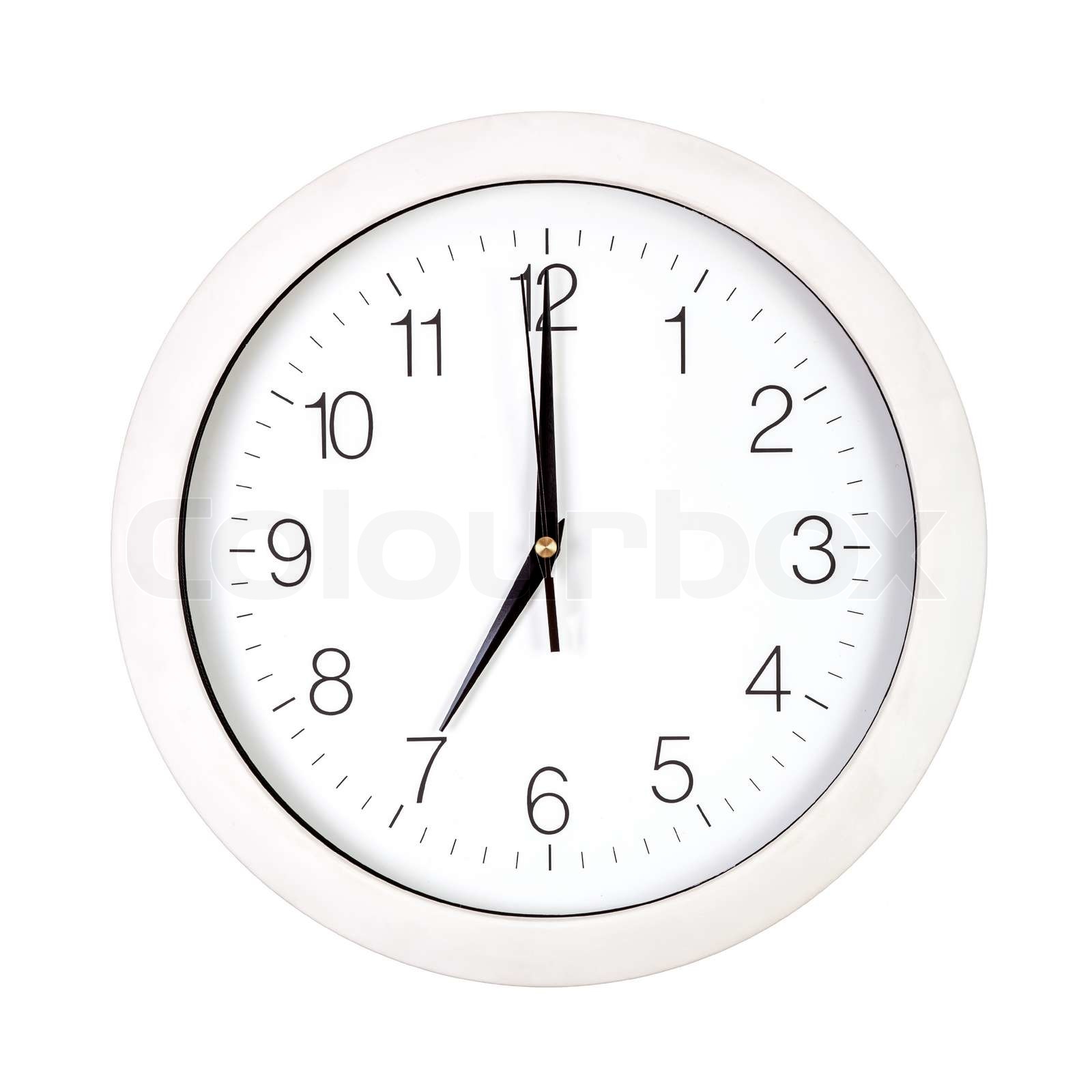 Clock face showing seven o'clock | Stock image | Colourbox