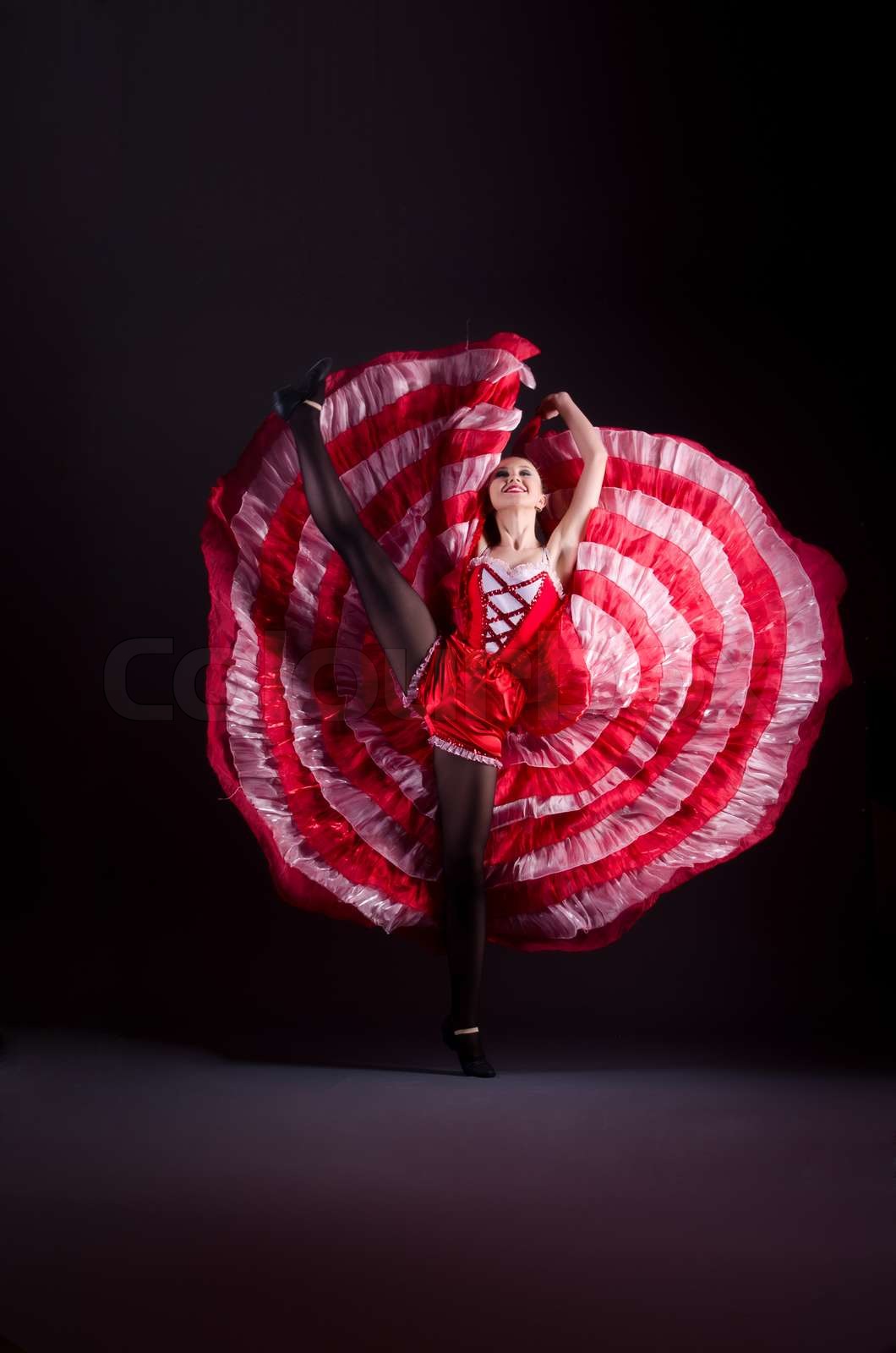 Girl in red dress dancing dance | Stock image | Colourbox