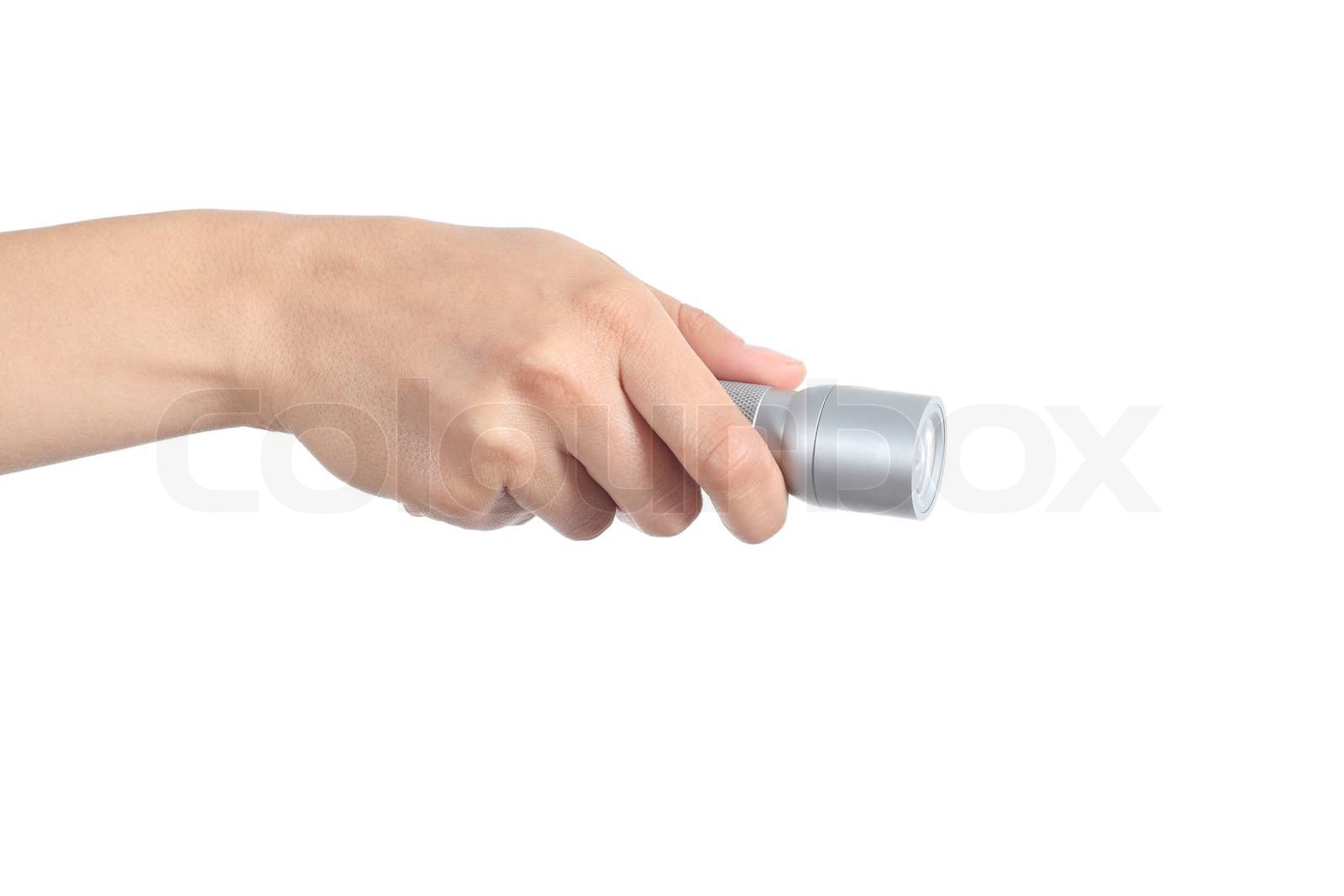 Woman hand holding a flashlight | Stock image | Colourbox