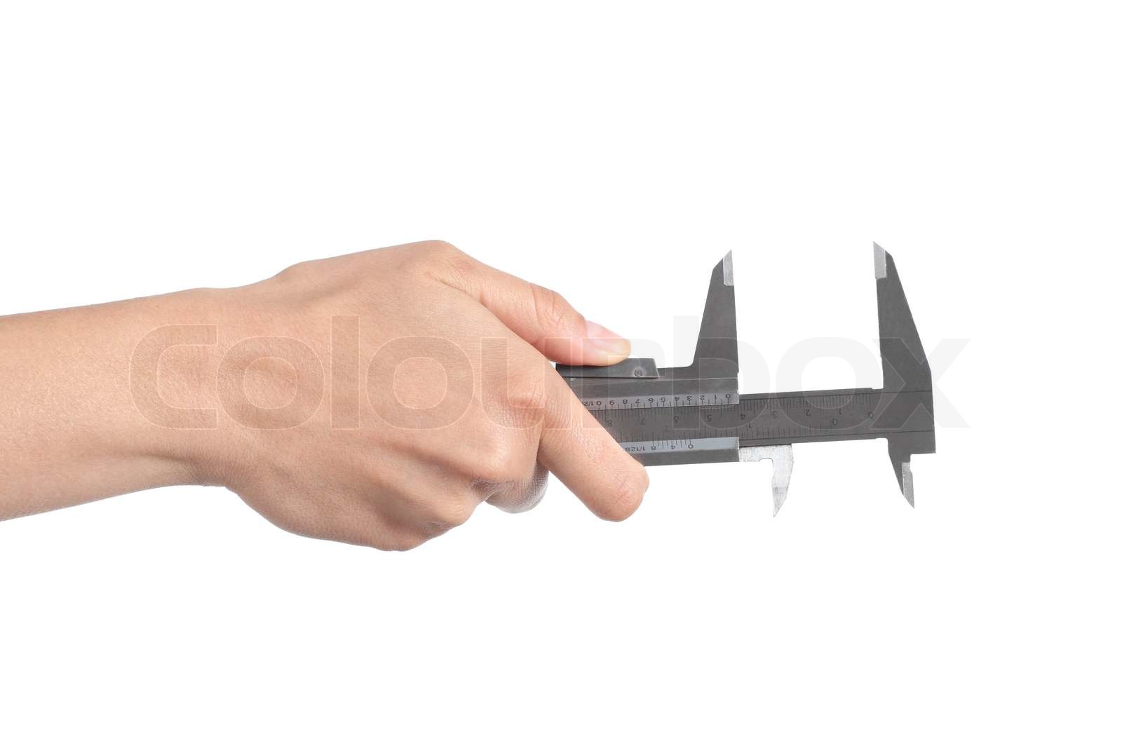 Woman Hand Messung mit einem Messschieber | Stock Bild | Colourbox