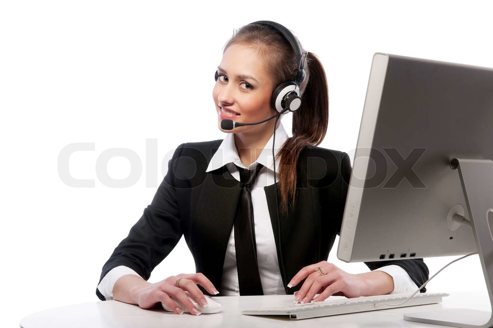 Mädchen und ein Computer | Stock Bild | Colourbox