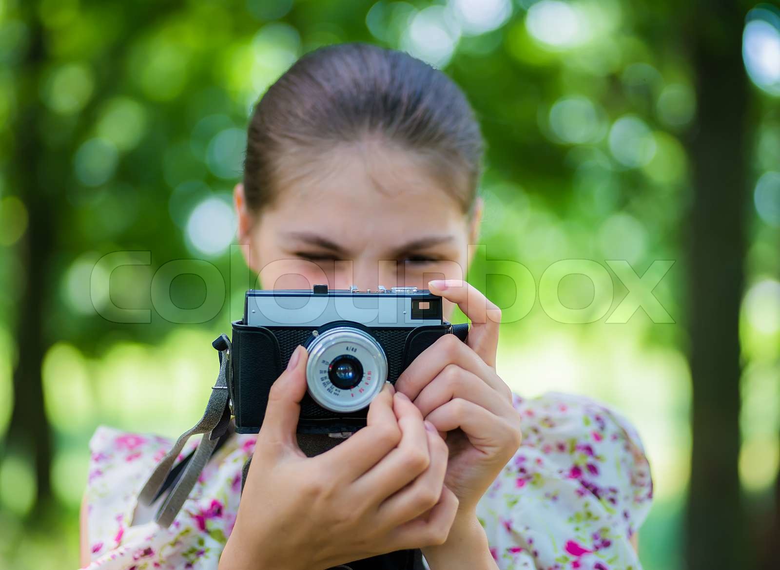 woman with a camera | Stock image | Colourbox