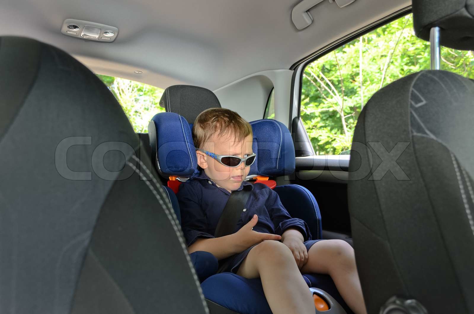 Little boy in car | Stock image | Colourbox