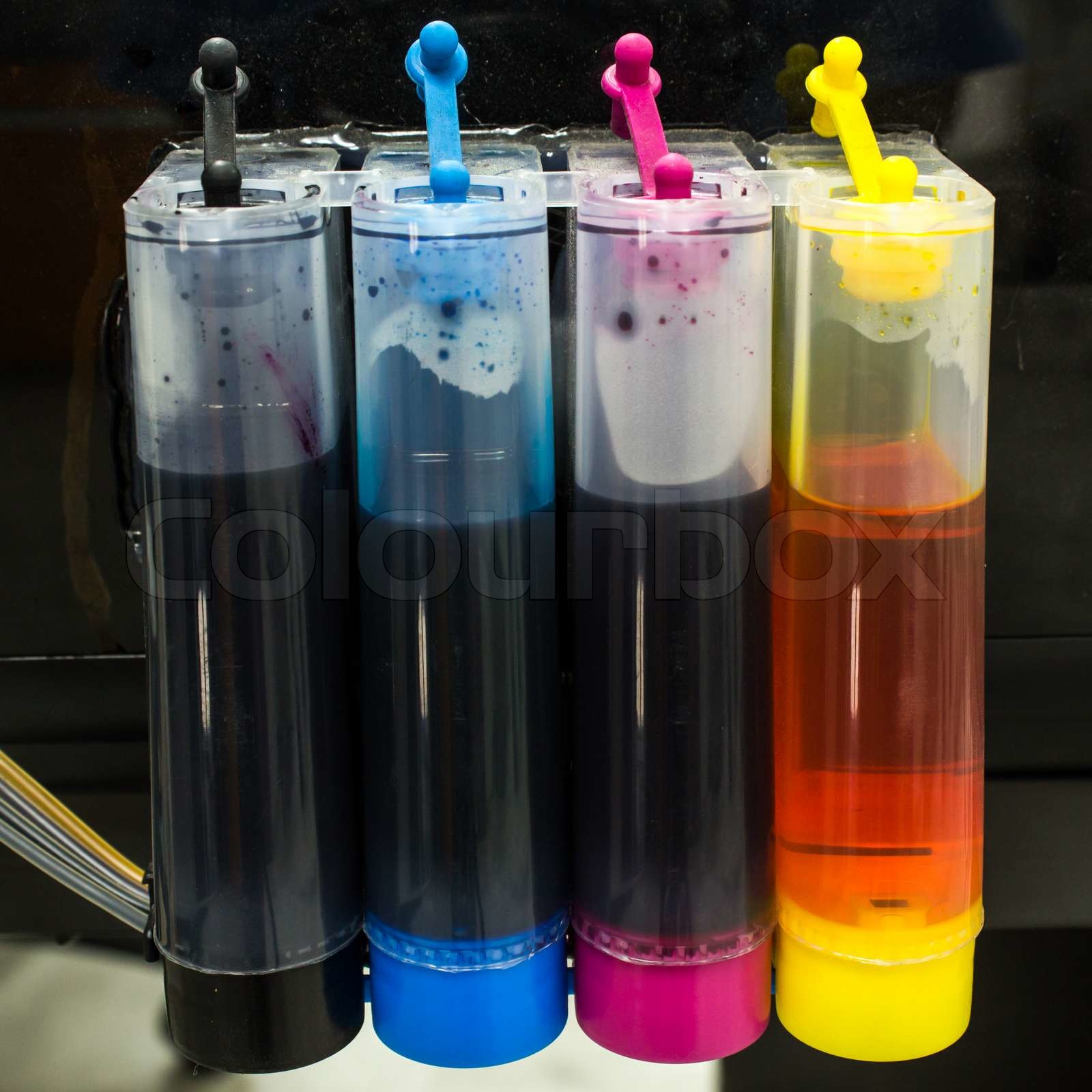 Cartridges and containers of continuous ink supply system | Stock image ...