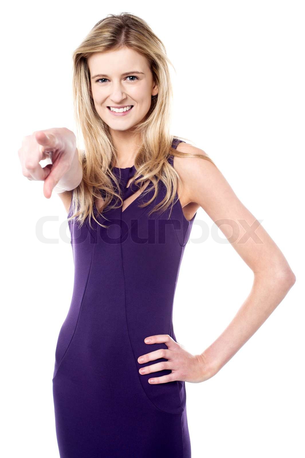 Gorgeous young girl pointing you out | Stock image | Colourbox