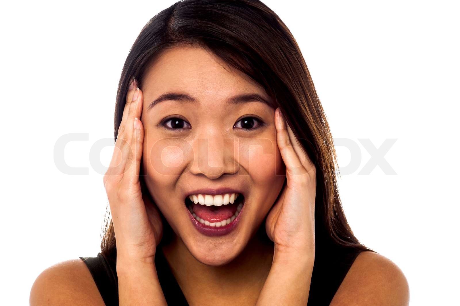 Shocking expression by a young girl | Stock image | Colourbox